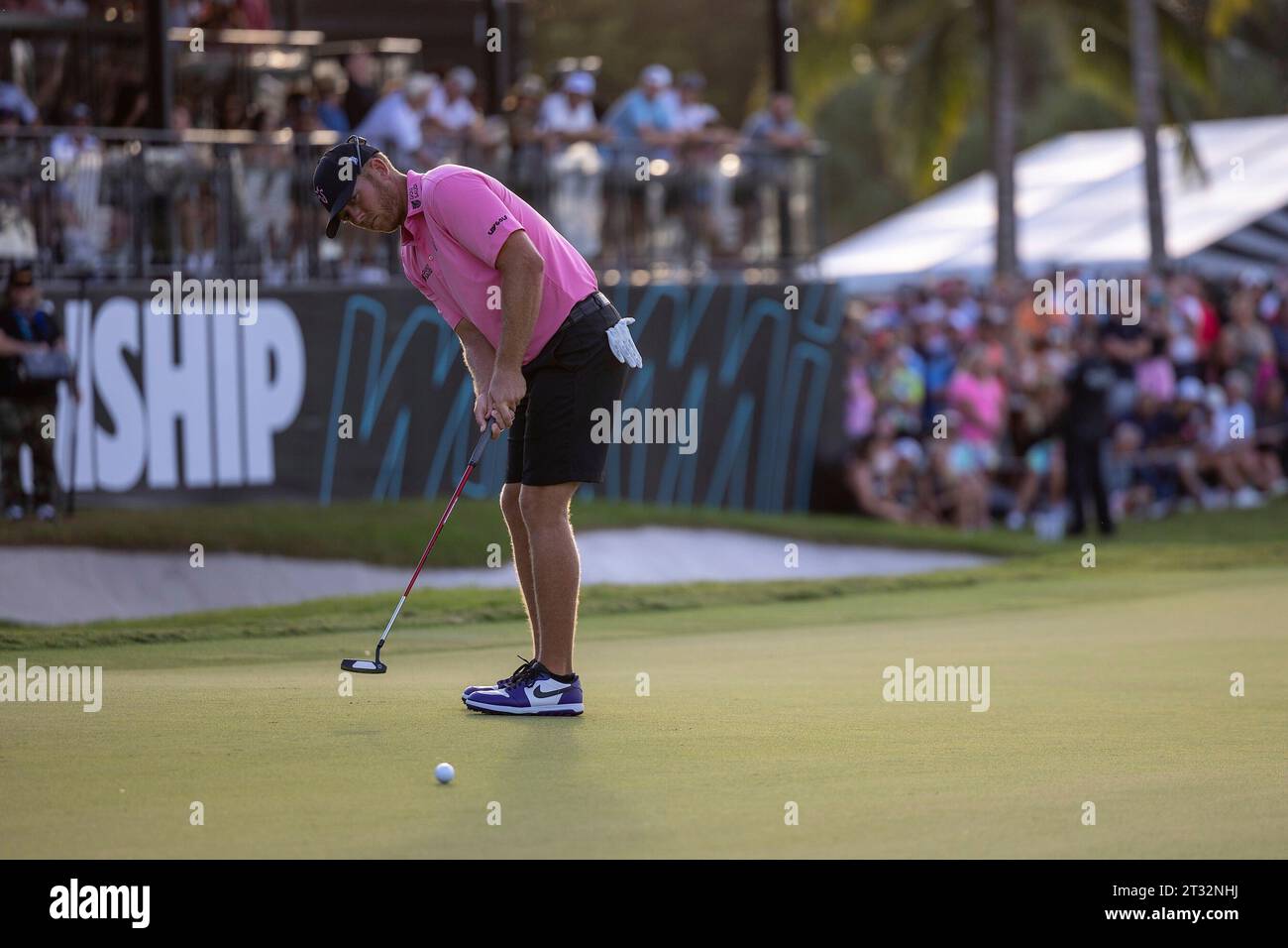 Talor Gooch of RangeGoats GC putts on the 18th green during the finals ...