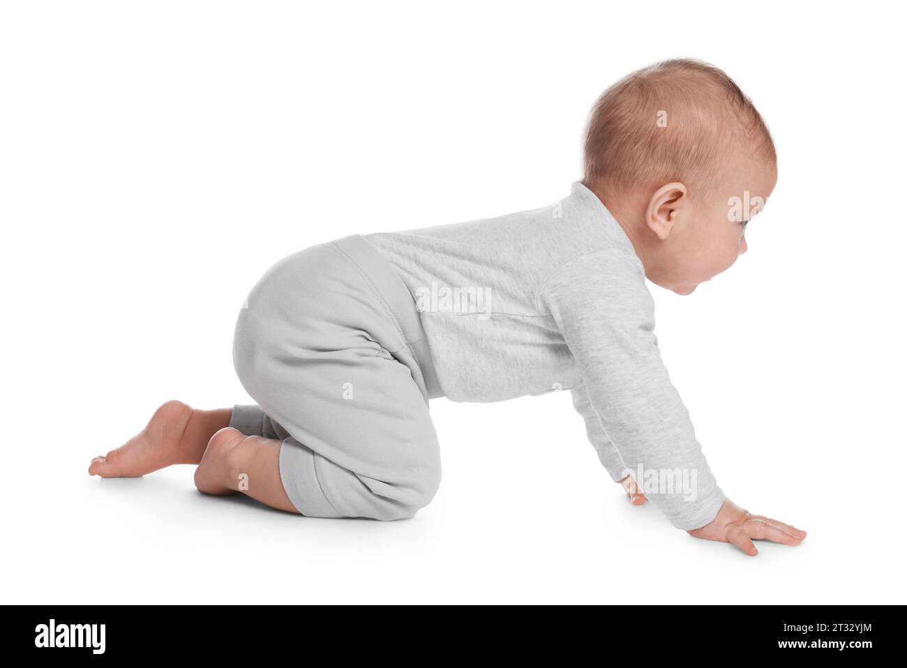 Cute little baby crawling on white background Stock Photo - Alamy