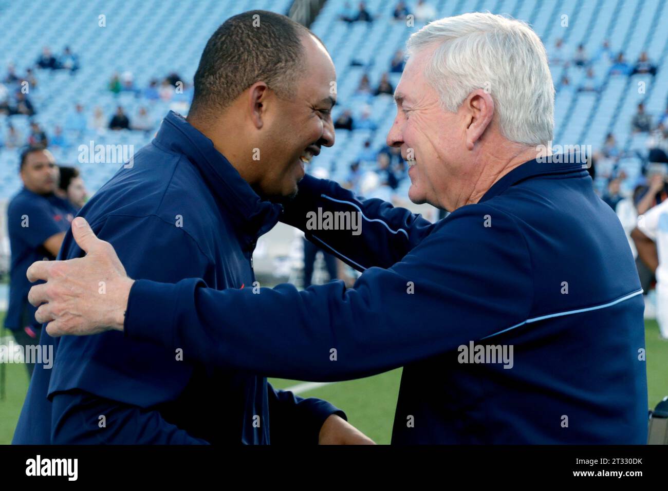 Virginia head coach Tony Elliott, left, and North Carolina head coach ...