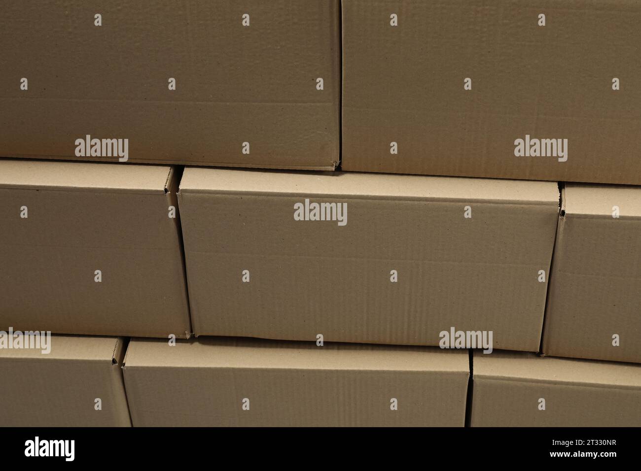 Stack of many closed cardboard boxes as background Stock Photo - Alamy