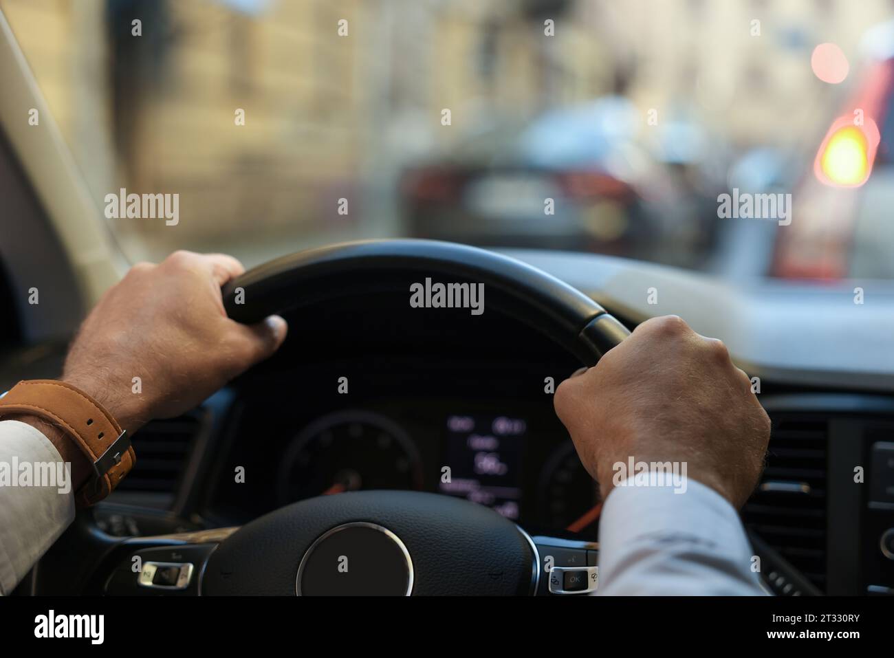 Hands holding steering wheel stuck hi-res stock photography and images ...