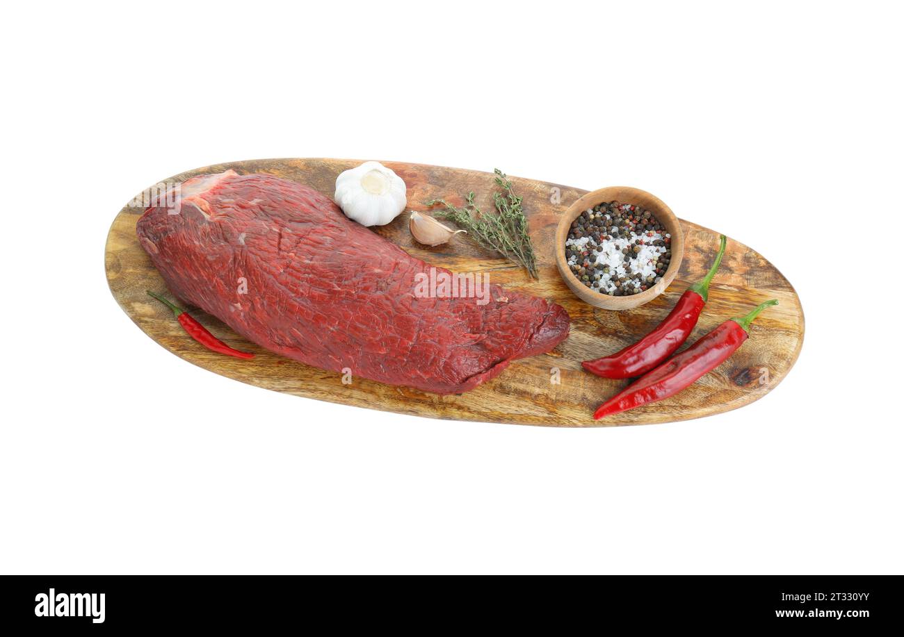 Piece of raw beef meat, products and spices isolated on white, top view ...