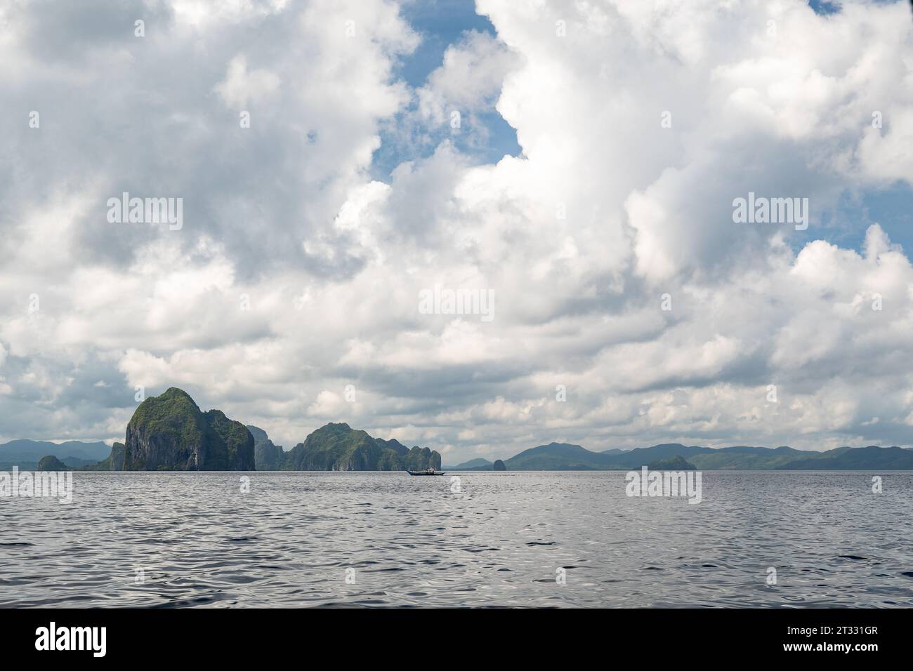 Scenic limestone karst formations rising out of tropical sea Stock ...