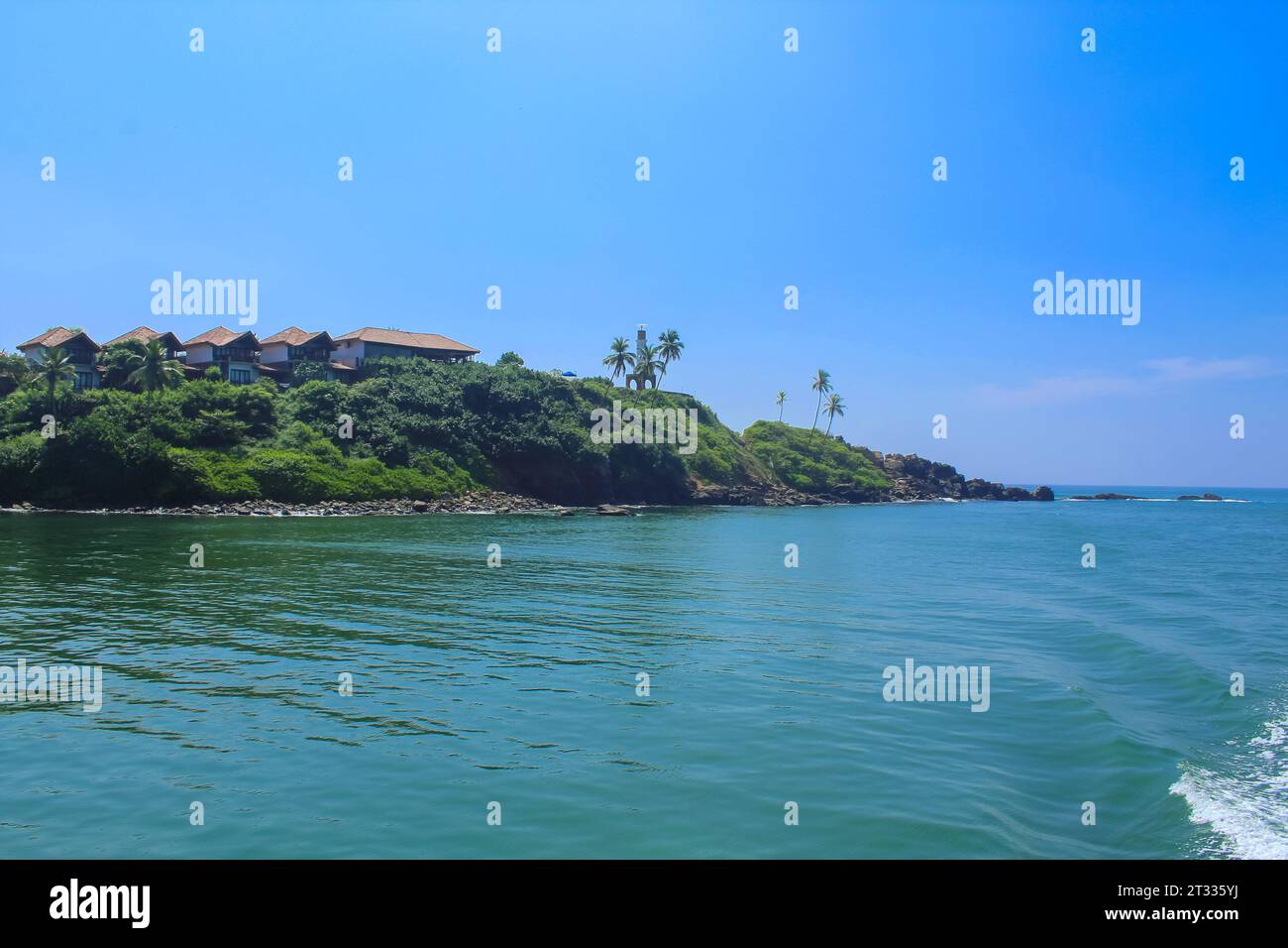 Two blue whales emerging from water on a sunny day, Indian Ocean, Sri ...