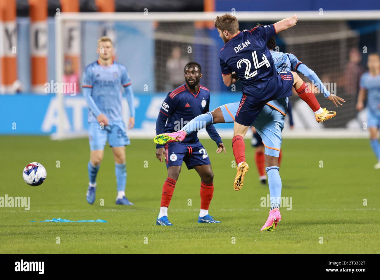 Chicago Fire FC midfielder Jonathan Dean (24) leaps to deflect the ball ...
