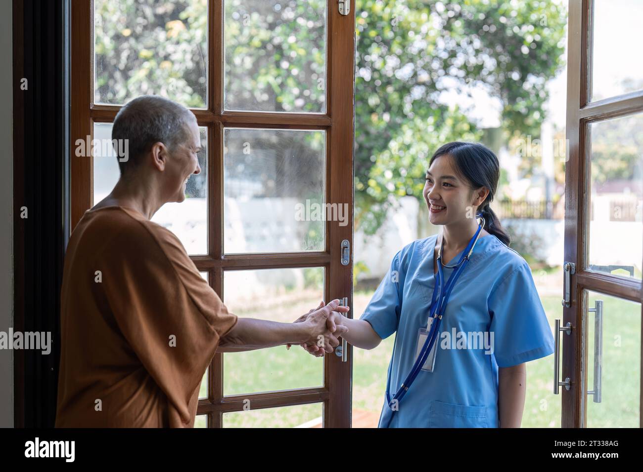 Elderly open door to doctors come for annual home health check-ups ...