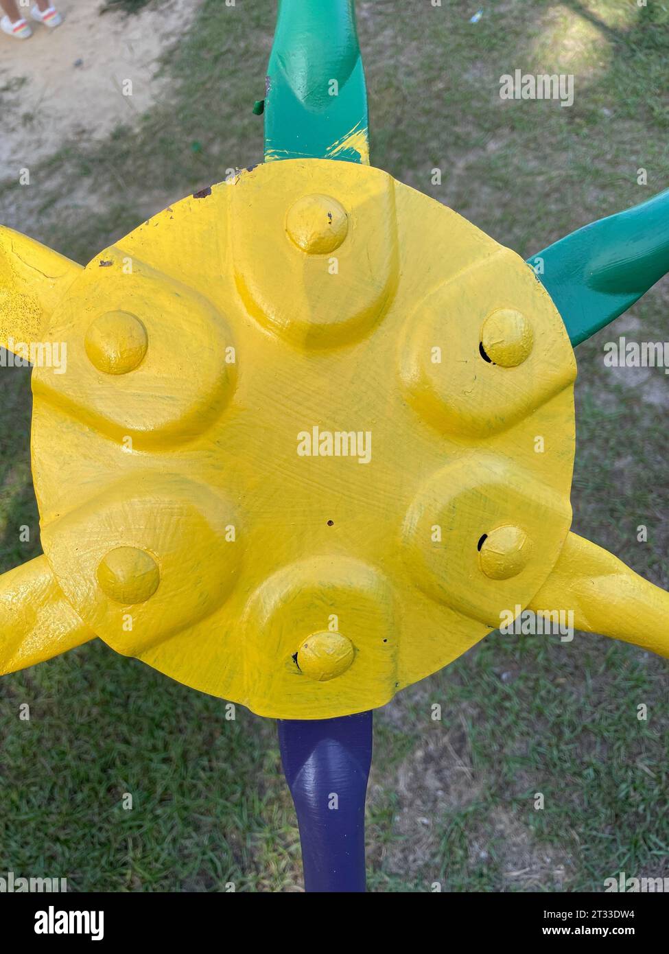 Yellow plate monkey bars close up background Stock Photo - Alamy