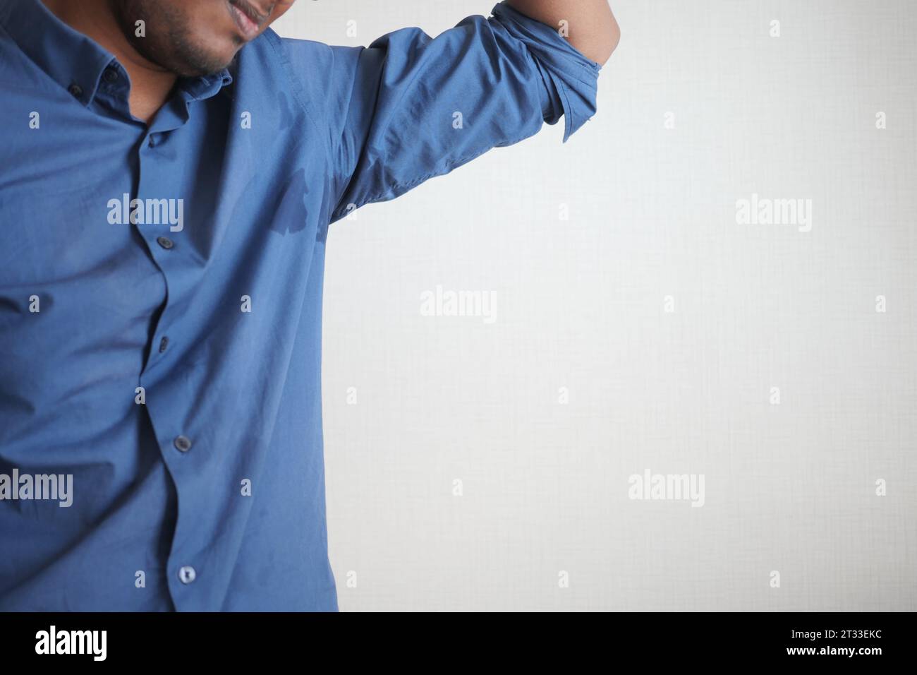 Smelling clothes armpit hi-res stock photography and images - Alamy