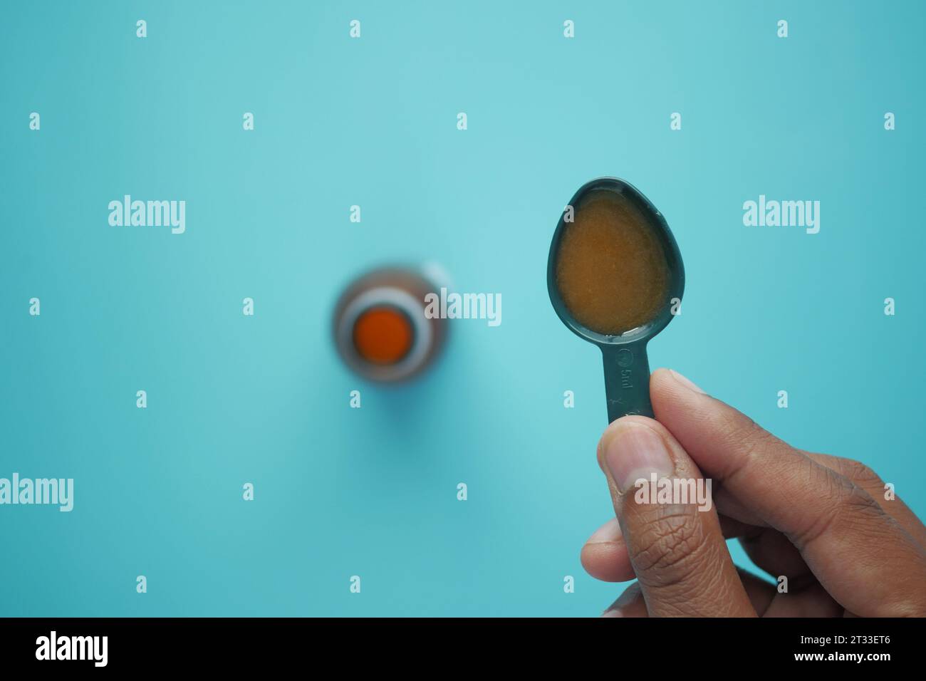 cough syrup on a spoon Stock Photo - Alamy