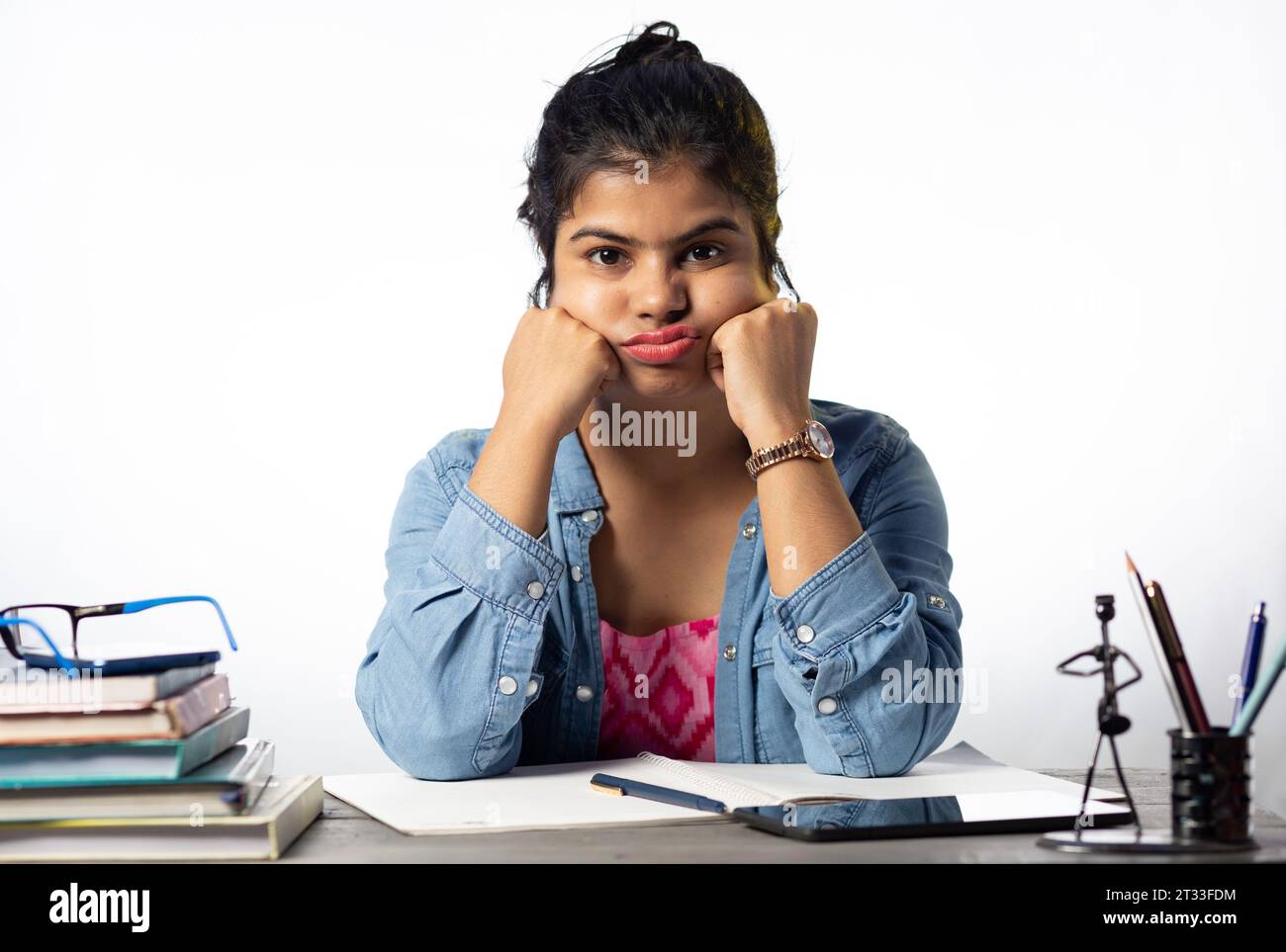 A pretty young Indian college student is angry for study load while ...