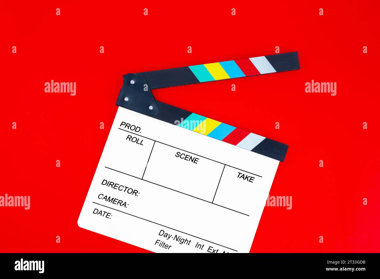 Blank film slate isolated on red color background Stock Photo - Alamy