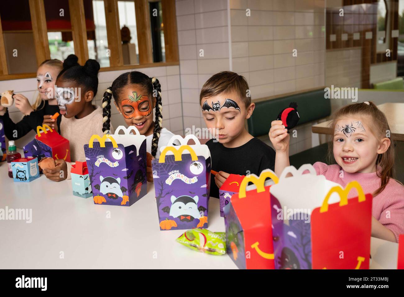 EDITORIAL USE ONLY Children visit McDonald's to have their faces ... EDITORIAL USE ONLY Children visit McDonald's to have their faces ...