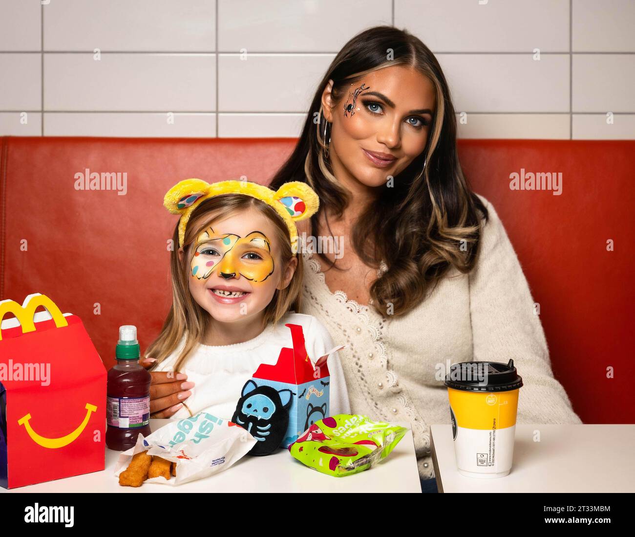 EDITORIAL USE ONLY Amy Childs visits McDonald's with her daughter Polly ...
