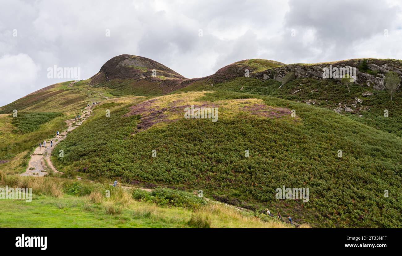 hikers climbing Conic Hill, near Balmaha and Loch Lomond, Scotland, UK ...