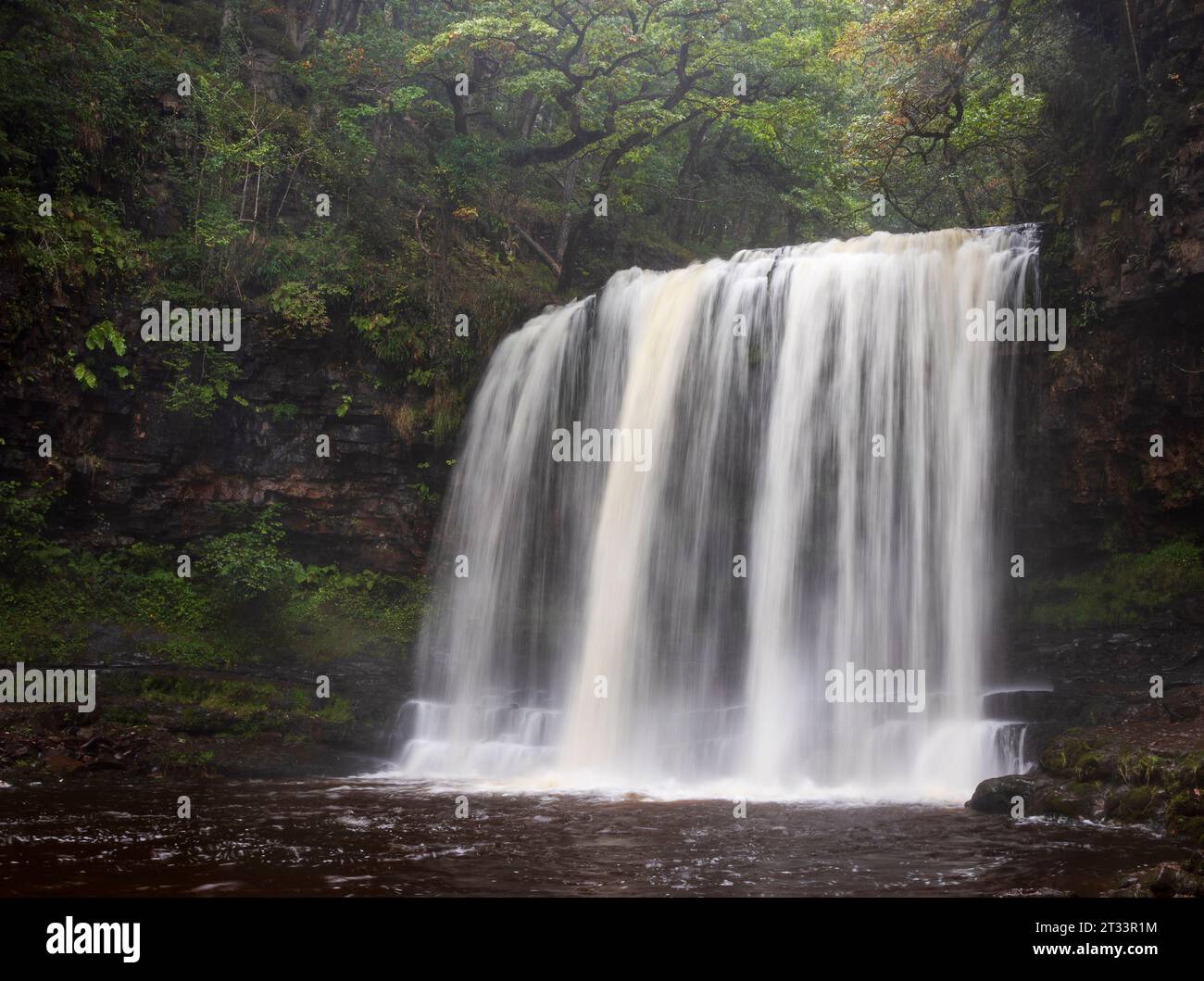 Waterfall Sgwd yr Eira on the four waterfalls walk in Brecon Beacons ...