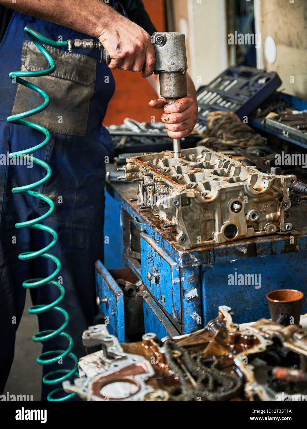 Strong hands mechanic holding hi-res stock photography and images - Alamy