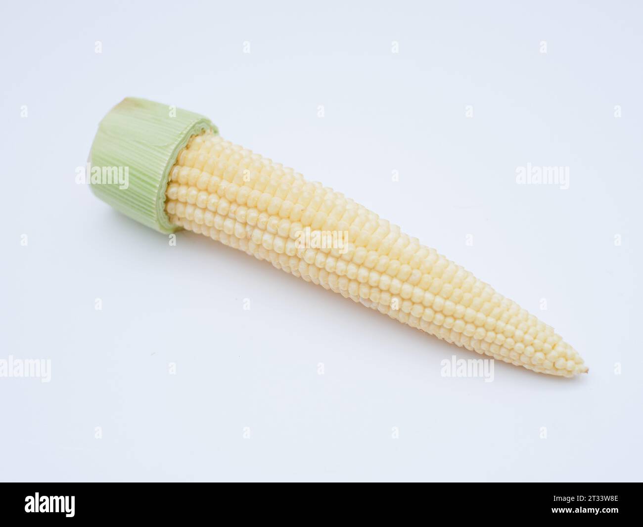 peeled baby corn isolated on white background Stock Photo - Alamy