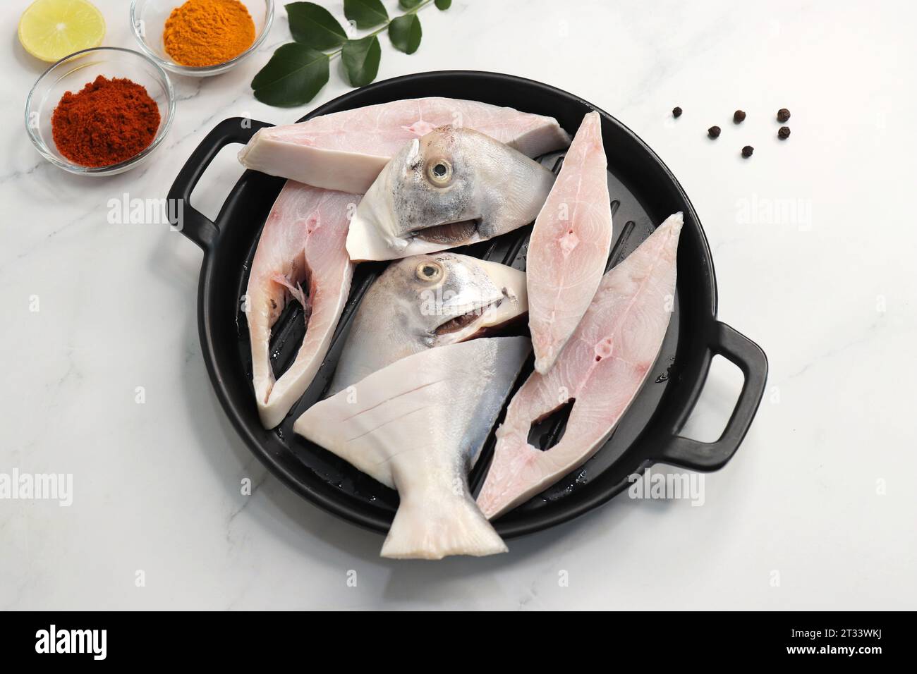 Fresh whole Silver Pomfret fish or butter fish or Poplet cut into ...