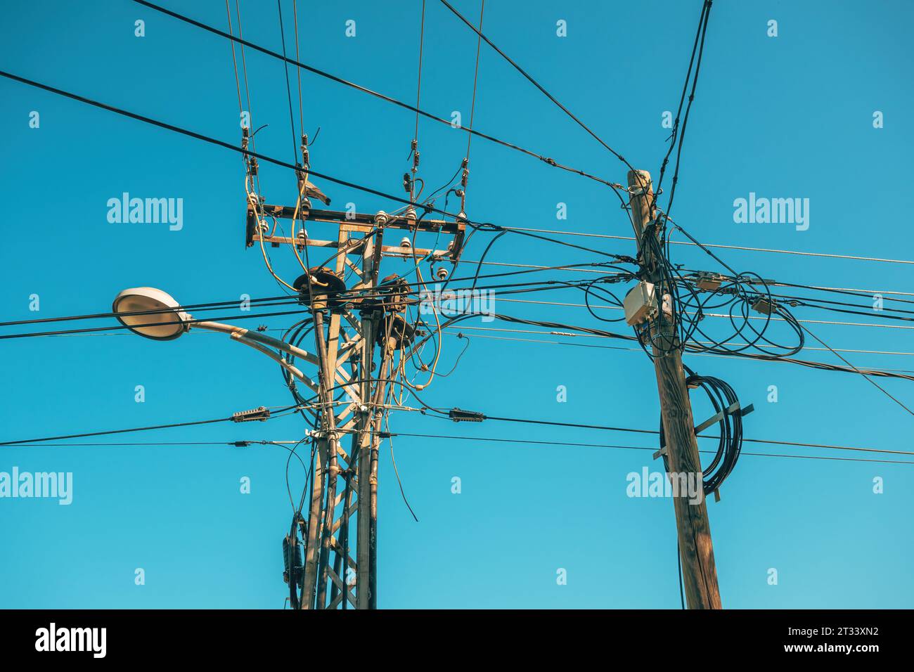 Street light with electricity utility pole and electrical wires, low ...