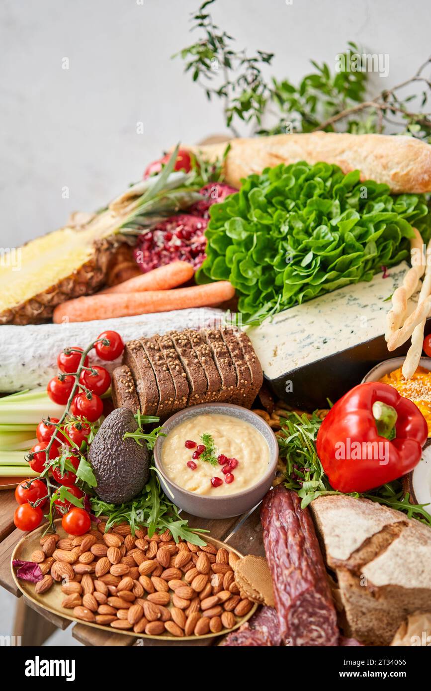 Table full of mediterranean appetizers, tapas or antipasto. Assorted ...