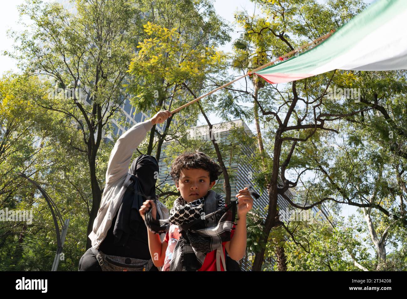 Pro-Palestine march, Mexico City, Mexico. 22nd Oct, 2023. a woman waves ...