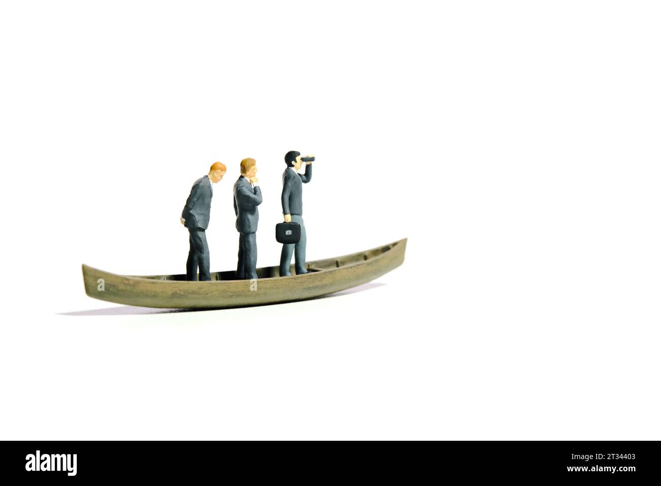 Miniature tiny people toy figure photography. Teamwork concept ...