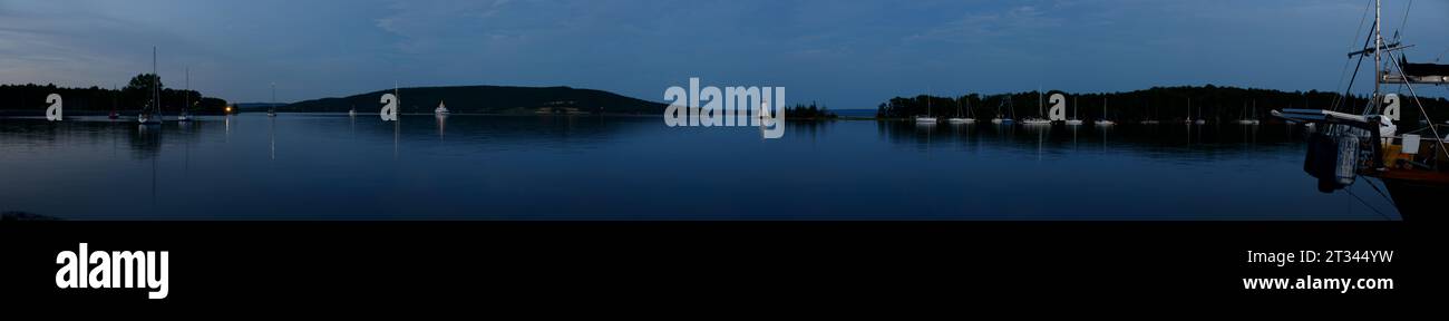 Panoramic view of lighthouse on an island in a lake Stock Photo - Alamy