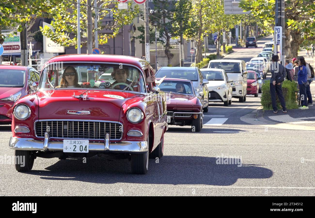 Vintage cars parade along a public road in Nagakute, Aichi Prefecture, central Japan, on Oct. 22 ...