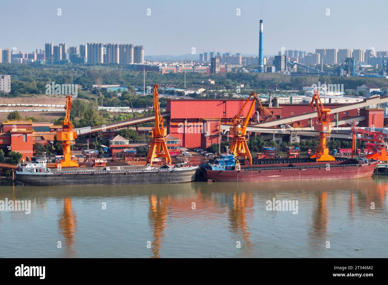 NANJING, CHINA - OCTOBER 23, 2023 - Cargo ships dock at Meishan Iron ...