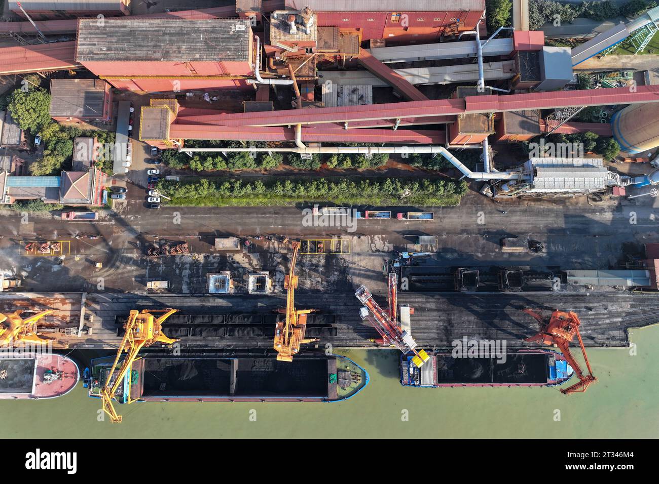 NANJING, CHINA - OCTOBER 23, 2023 - Cargo ships dock at Meishan Iron ...