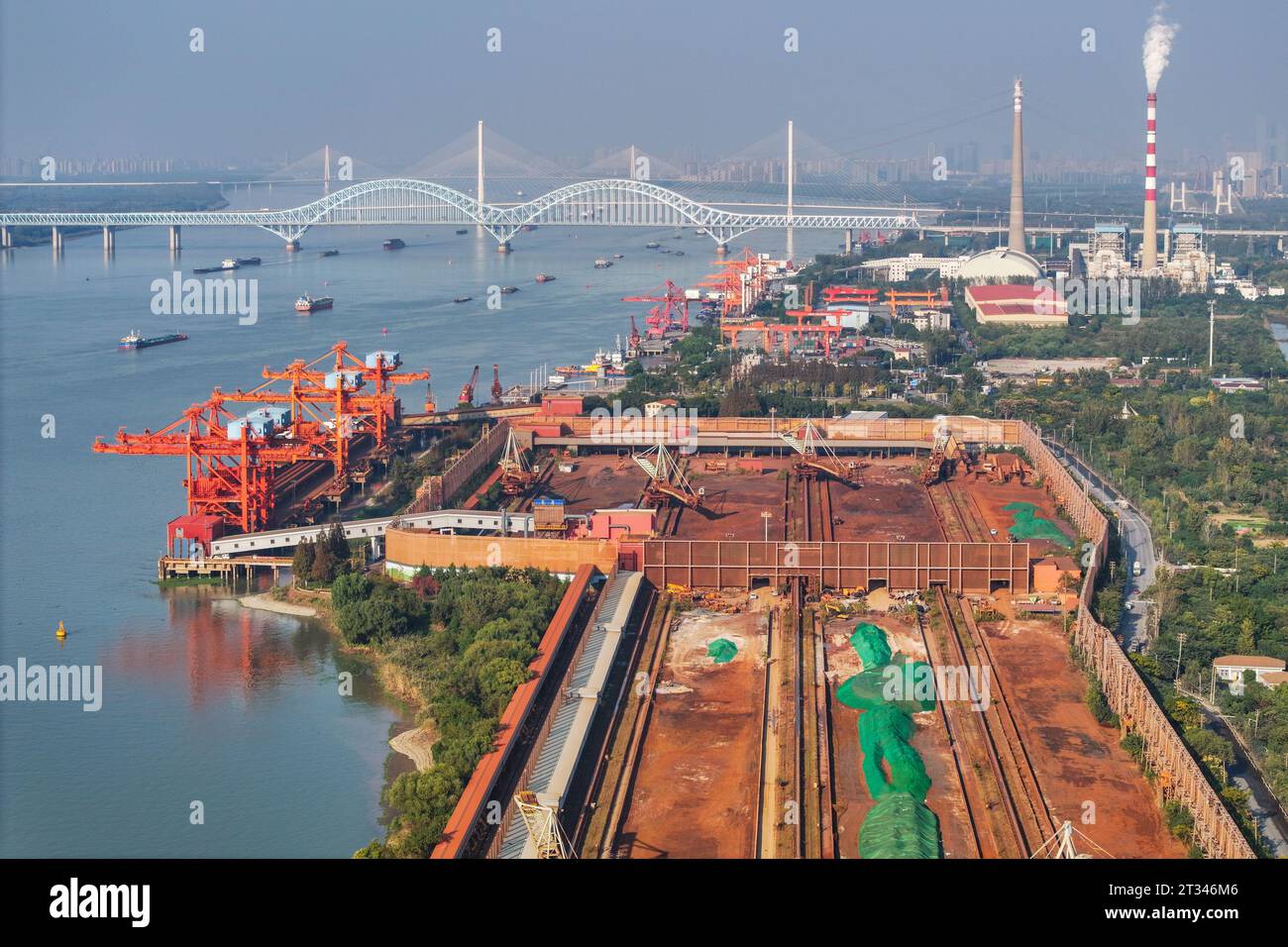 NANJING, CHINA - OCTOBER 23, 2023 - Cargo ships dock at Meishan Iron ...