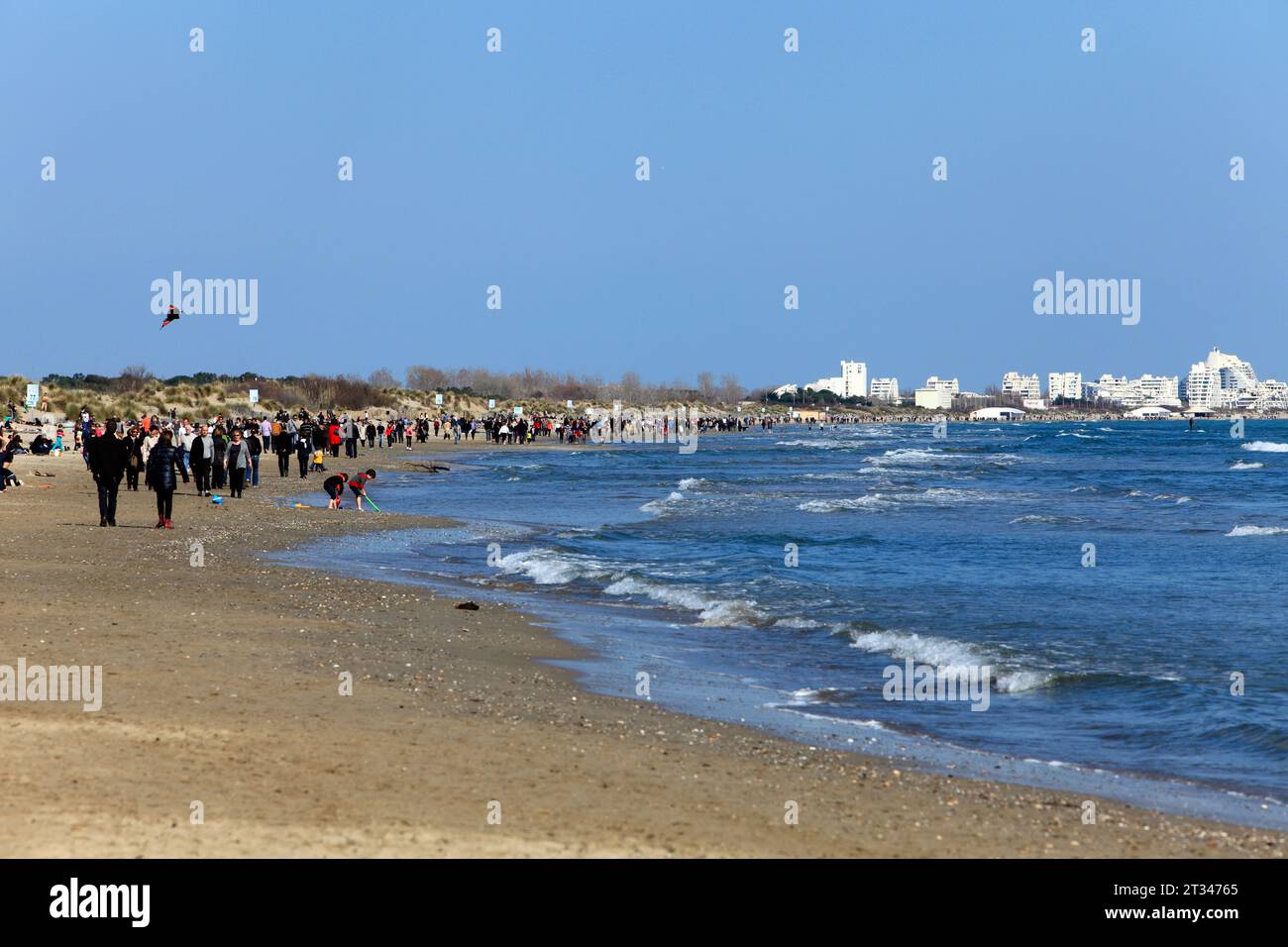 Walks and beach activities in spring on Grand Traverse beach. Mauguio ...