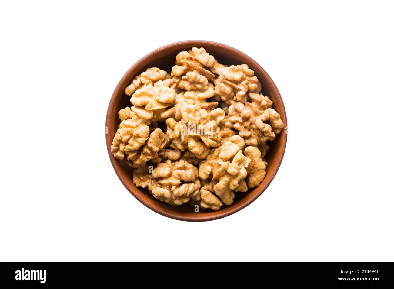 Roasted walnuts in bowl isolated on white background. walnuts is snack ...