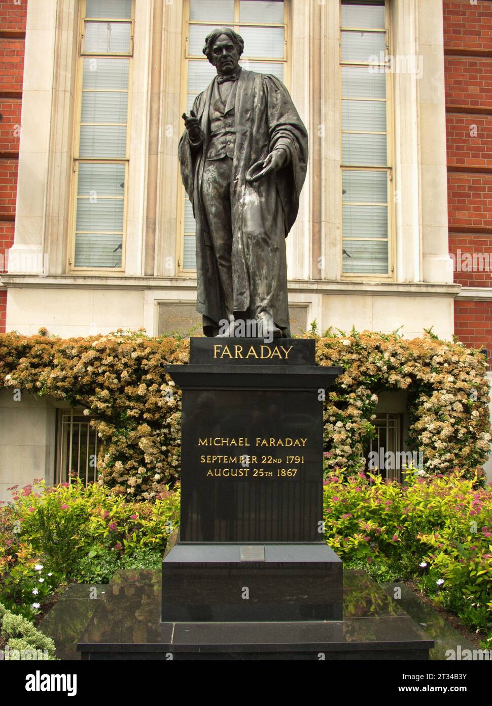 A statue of English scientist Michael Faraday,Savoy Place Stock Photo ...