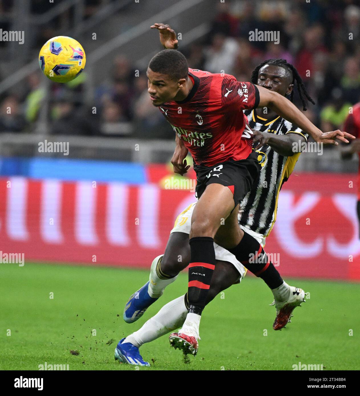 Milan, Italy. 22nd Oct, 2023. AC Milan's Malick Thiaw (L) vies with FC ...