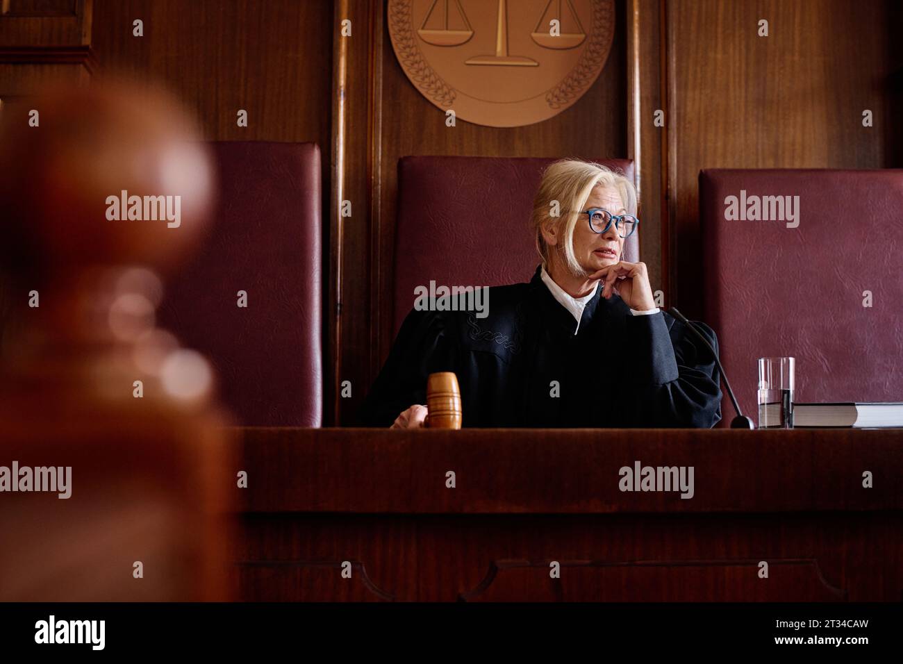 Judge gavel gown hi-res stock photography and images - Alamy