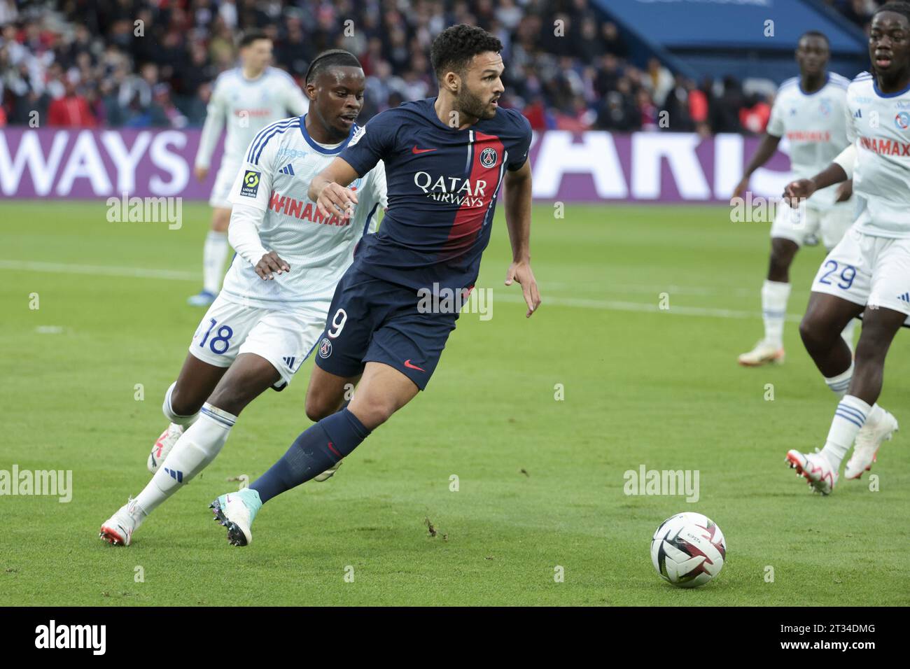 Goncalo Ramos of PSG, left Junior Mwanga of Strasbourg during the French championship Ligue 1 ...