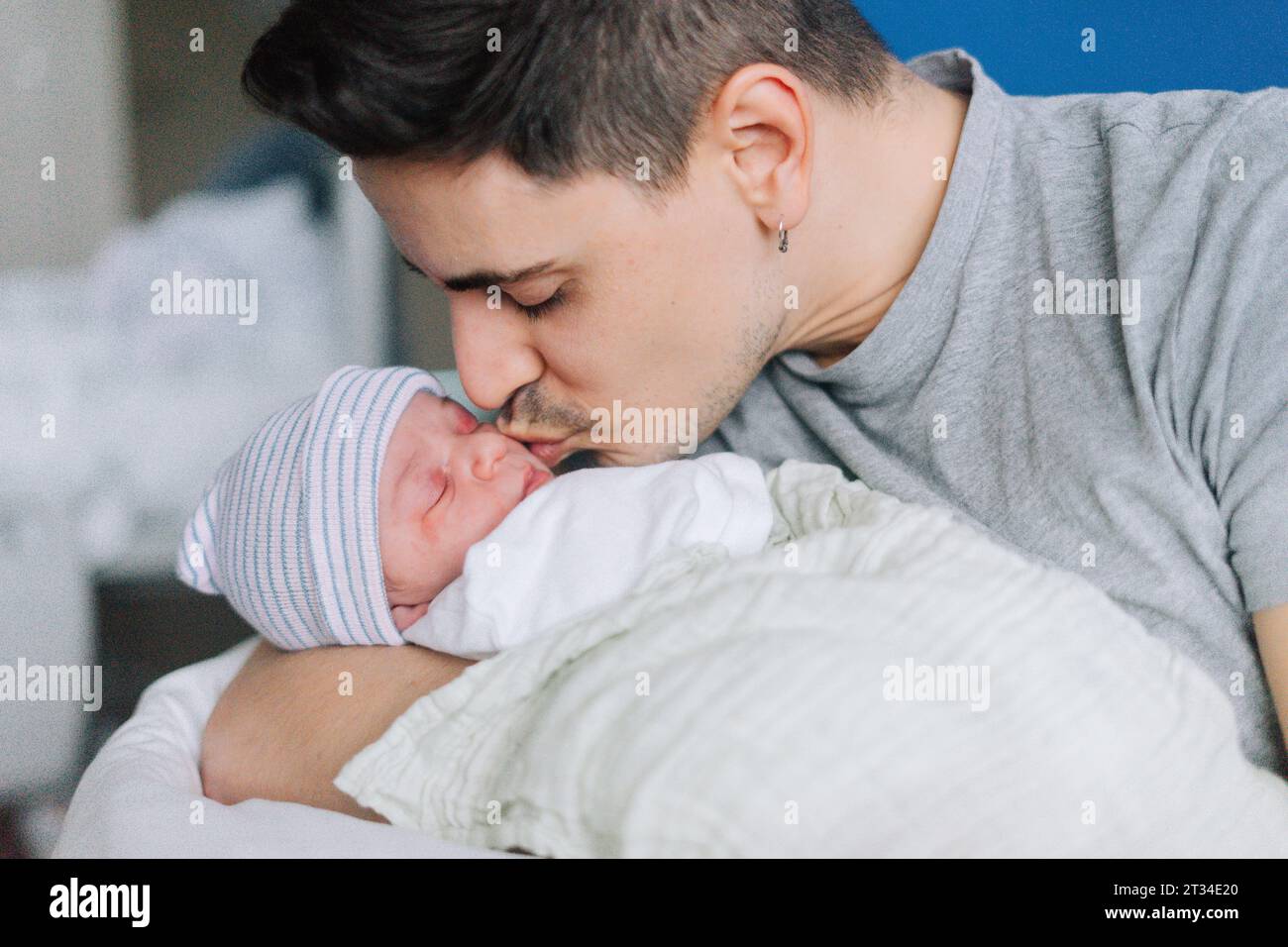Portrait of a father with his one day old firstborn baby Stock Photo ...