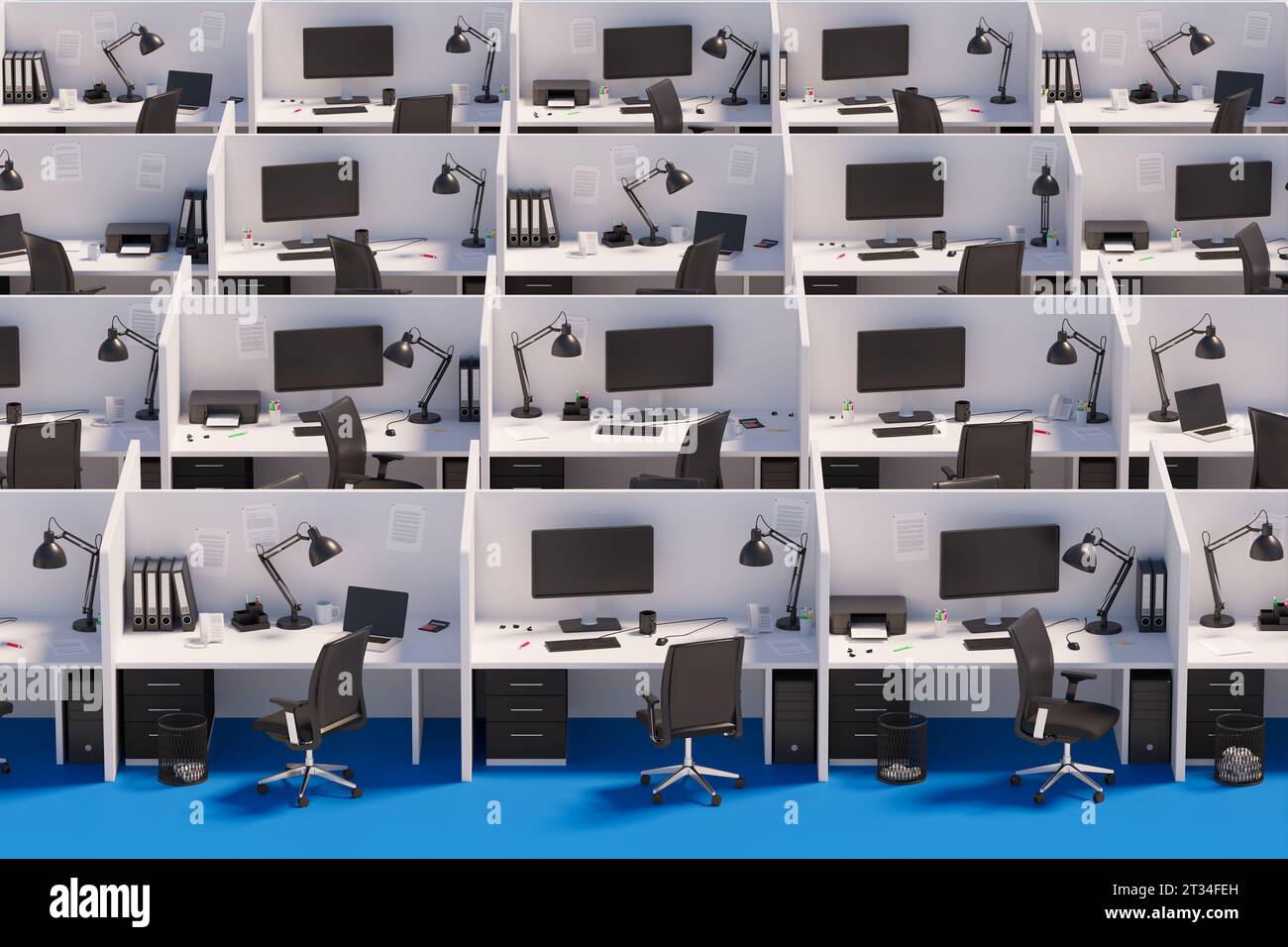 High-angle view of cubicles with tables, chairs, and computers in a ...