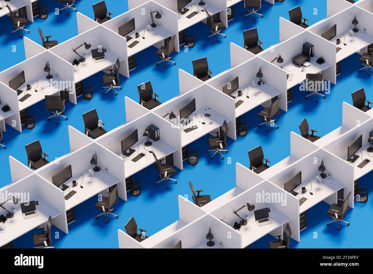 High-angle view of cubicles with tables, chairs, and computers in a ...