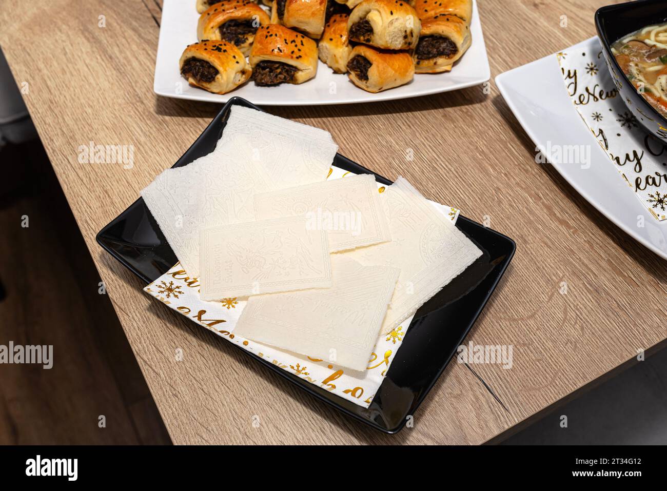Wafer lying on the hay on the Christmas table during Christmas Eve in ...