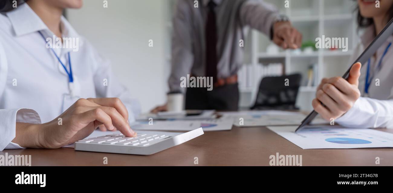 Colleague discuss business brainstorming and price charts analyze ...