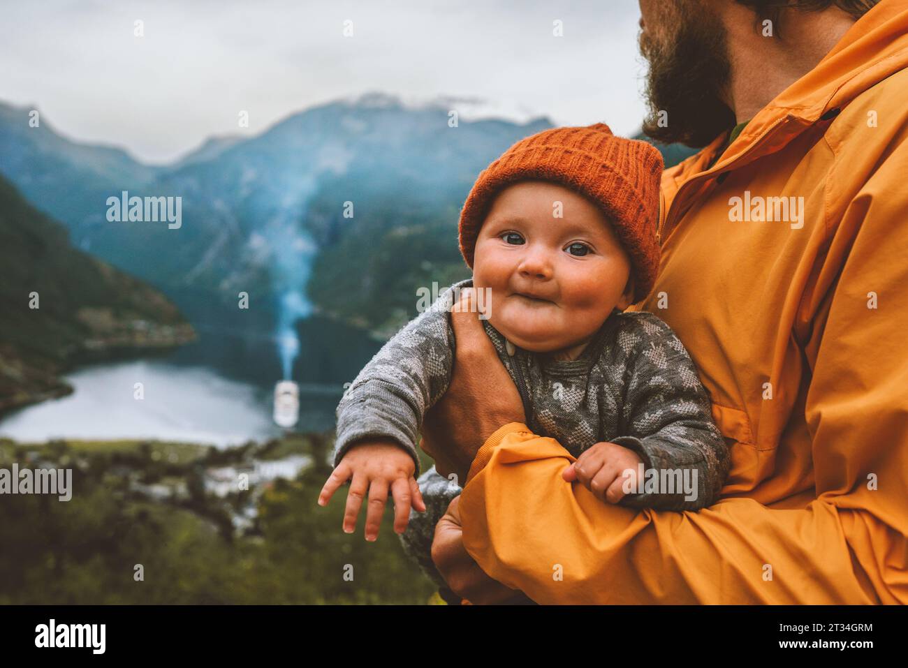 Baby with father family traveling in Norway together sightseeing ...