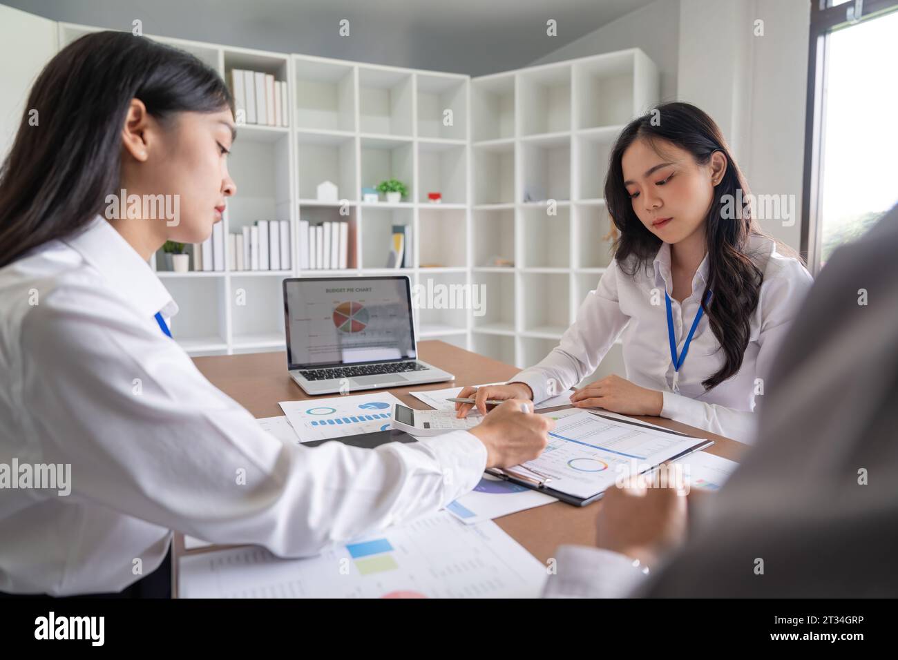 Colleague discuss business brainstorming and price charts analyze ...