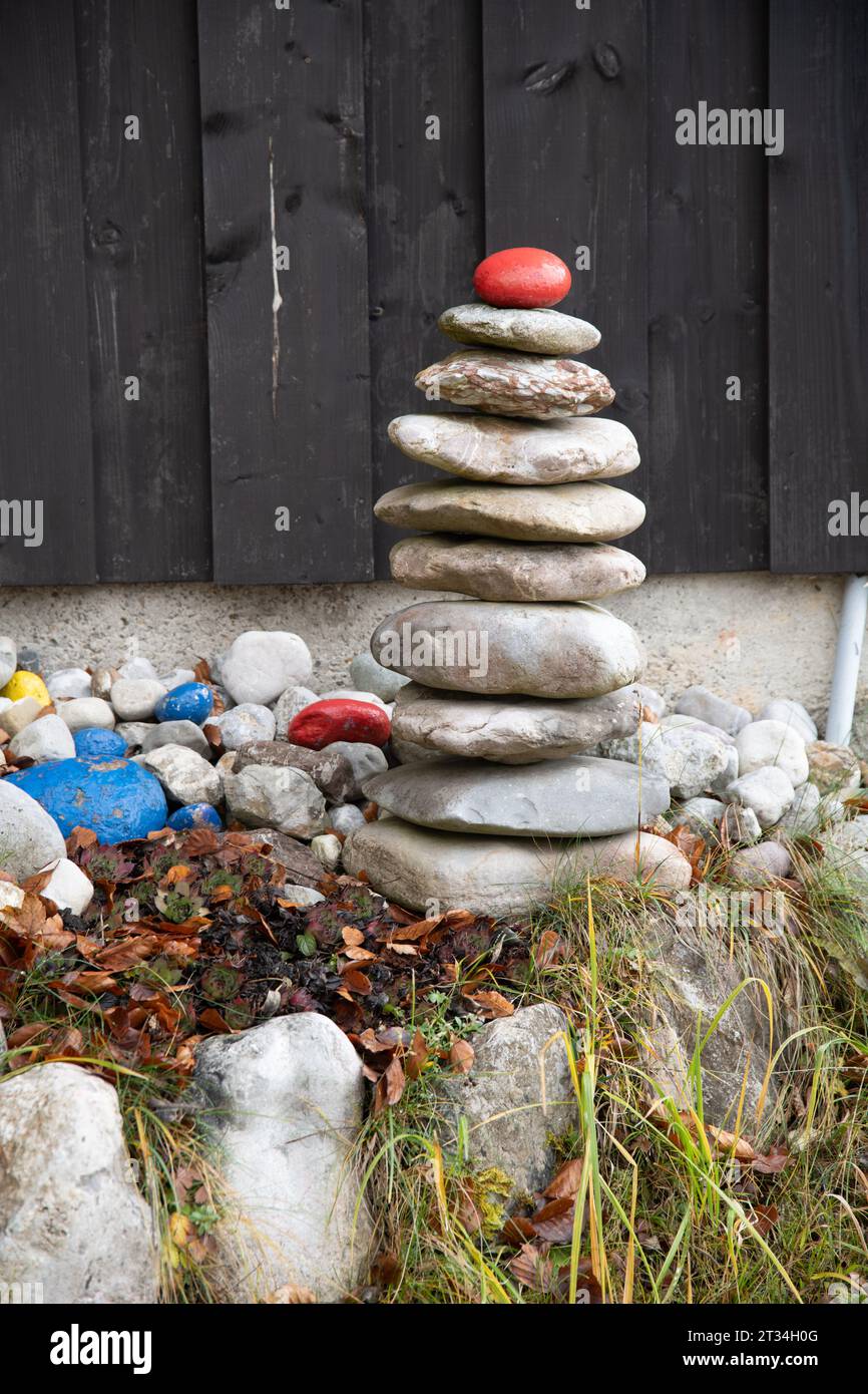 A stone tower in a garden Stock Photo - Alamy