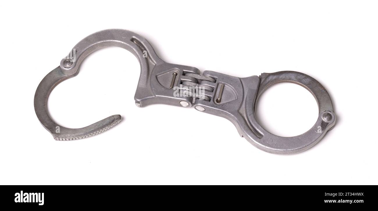 Modern strong handcuffs isolated on white background Stock Photo - Alamy