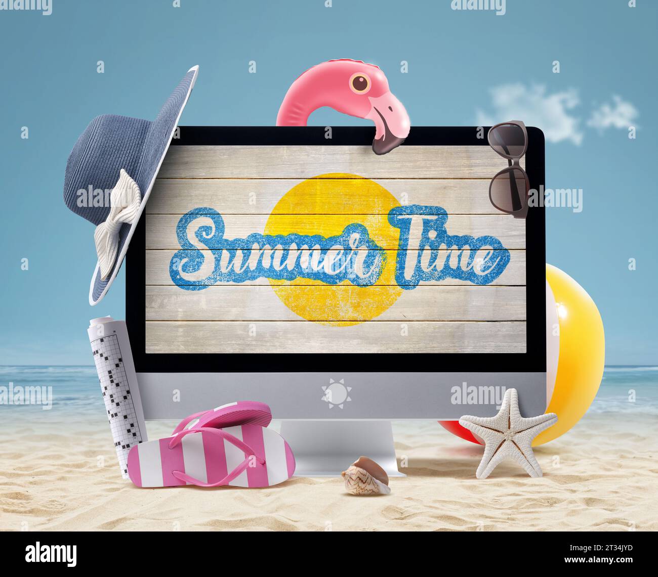 Computer with blank screen and colorful beach accessories, summer ...