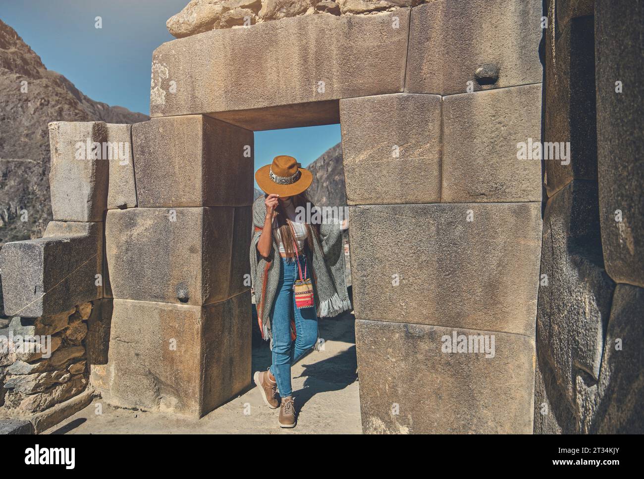 A Girl at the Entrance of ruins of Ollantaytambo Ruins in Sacred Valley ...