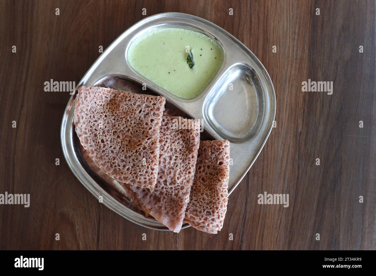 Ragi Ghavne and chutney, or Neer Dosa, is a popular breakfast dish from ...