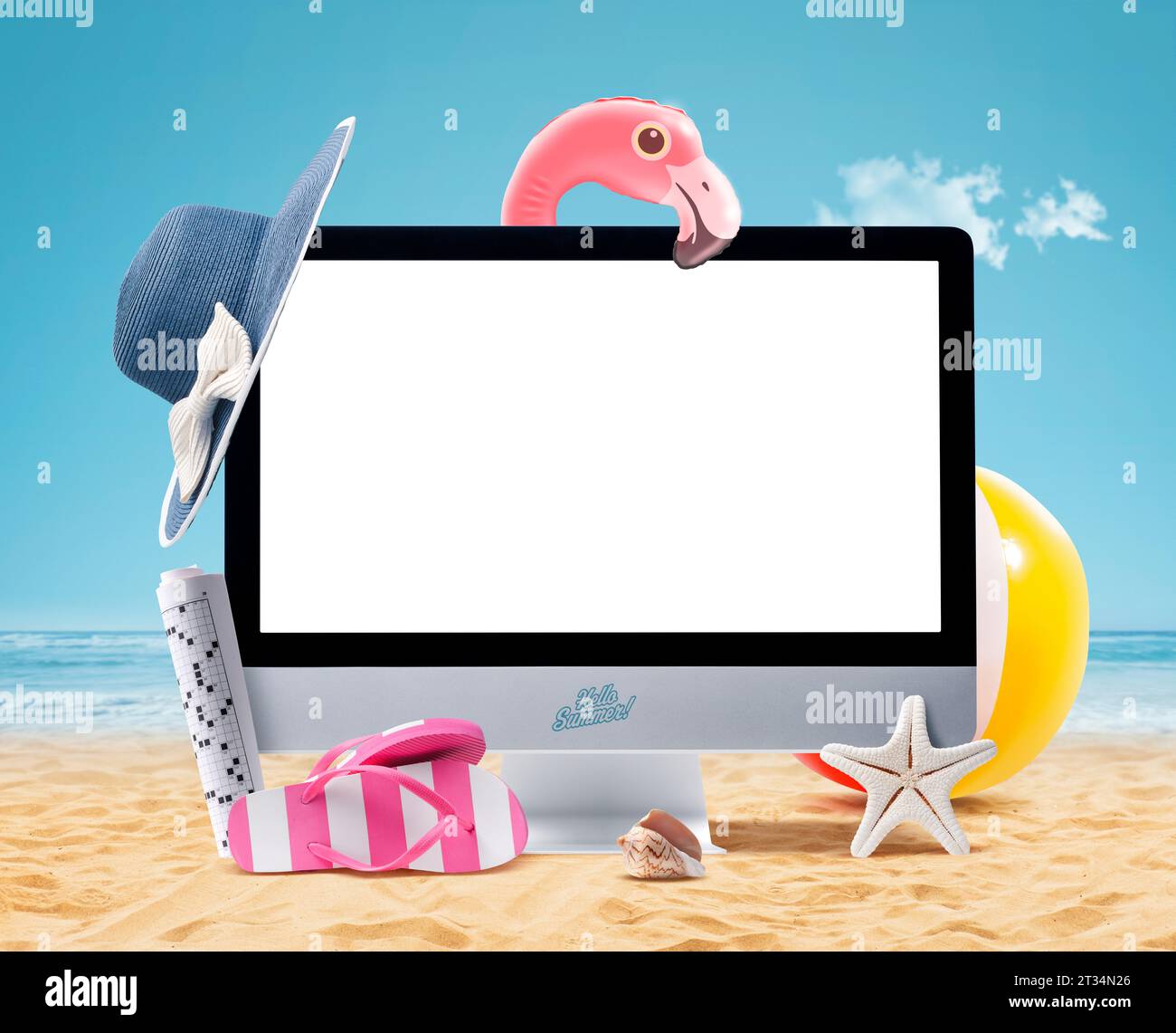 Computer with blank screen and colorful beach accessories, summer ...